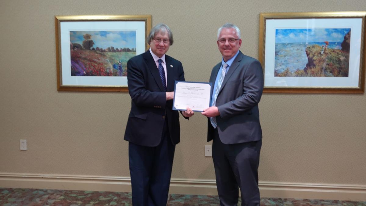 Pacanowski earns government certification designation