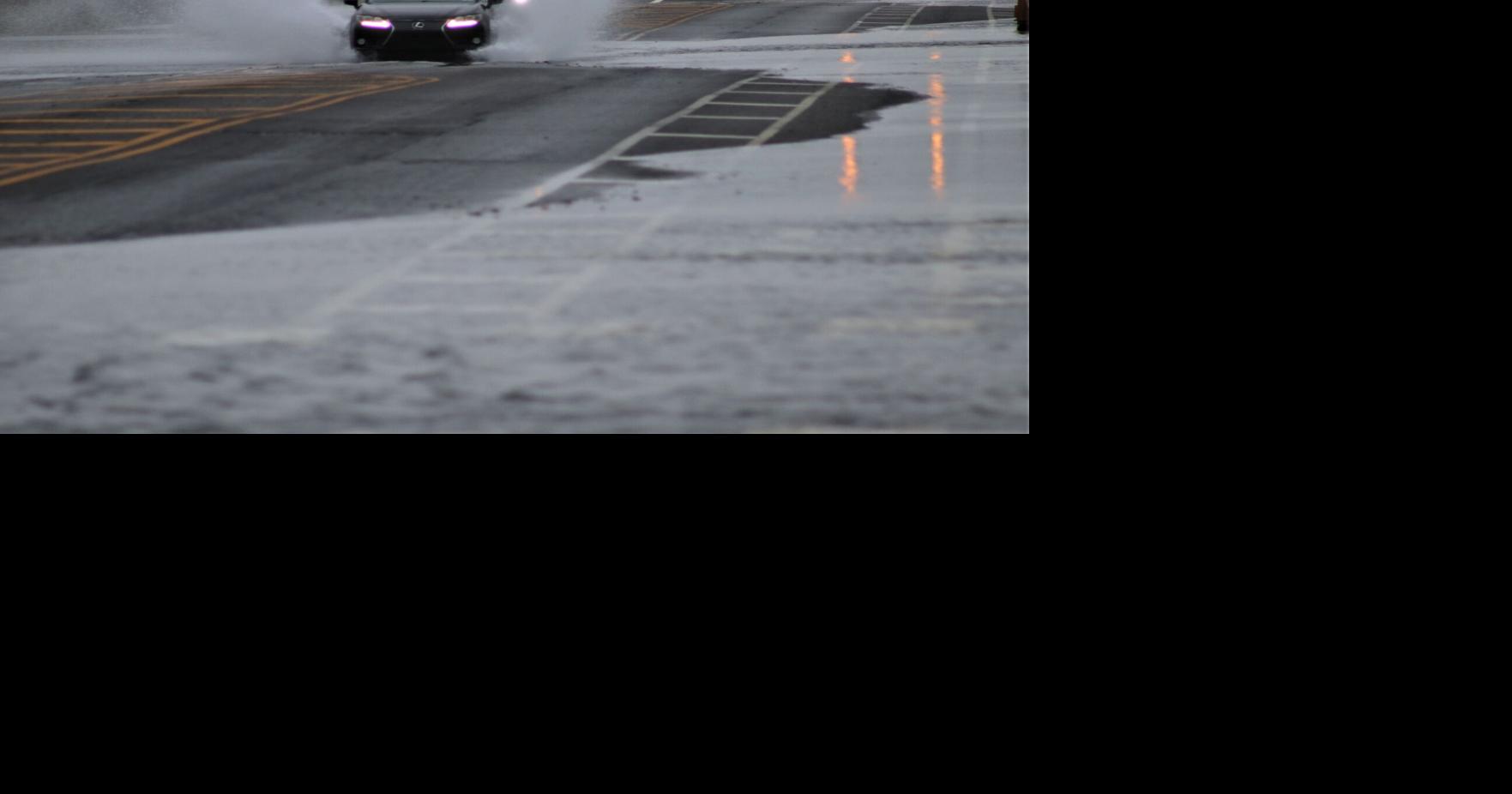 More coastal flooding, rain showers to come Saturday as strong winds end