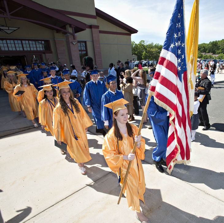 Holy Spirit High School salutatorians stir whimsy as 128 walk ...