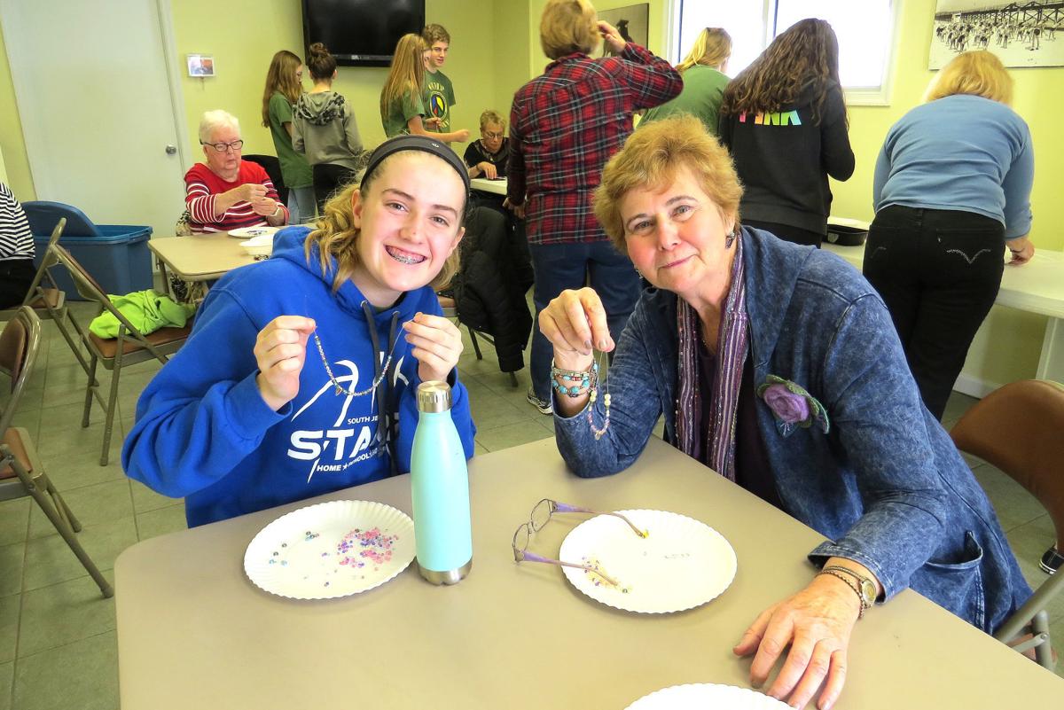Tighe honor students make jewelry with senior citizens at the Bloom ...