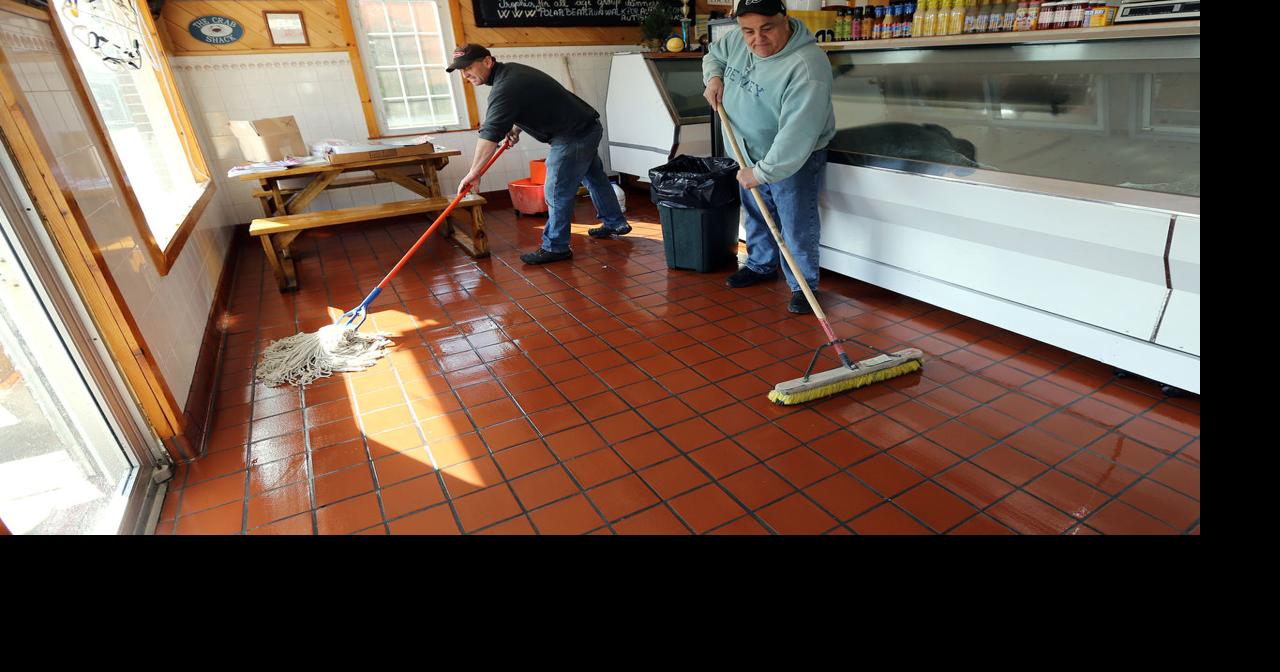 Cape residents still scrubbing away smelly mud from Jonas