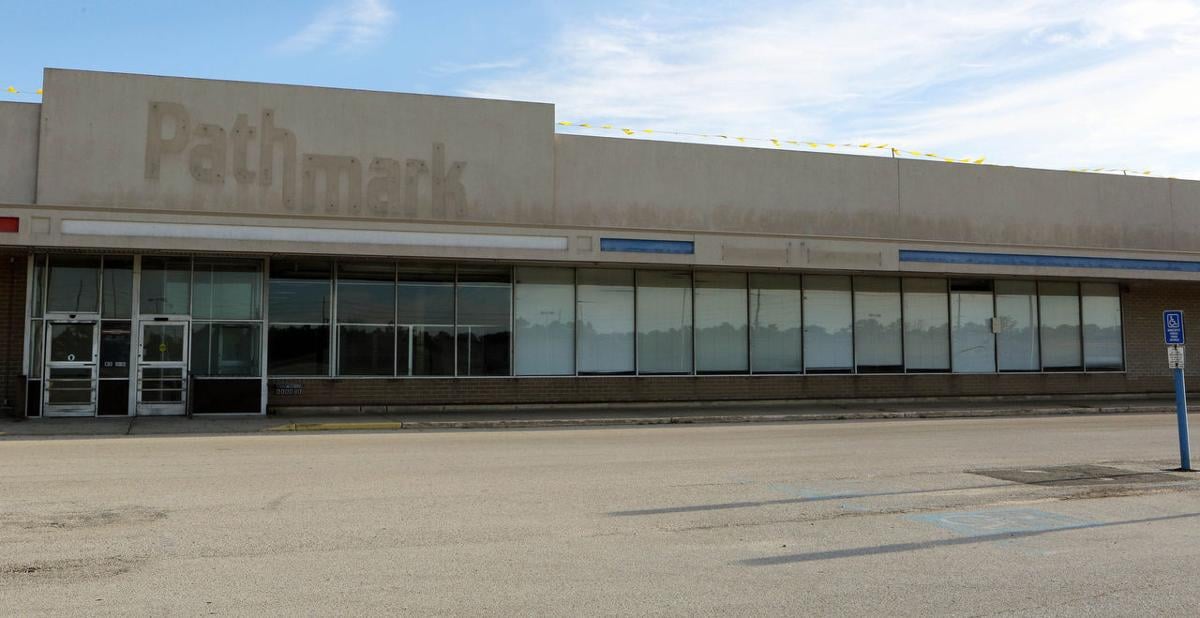 Contractor repairing Cardiff Shopping Center | Business ...