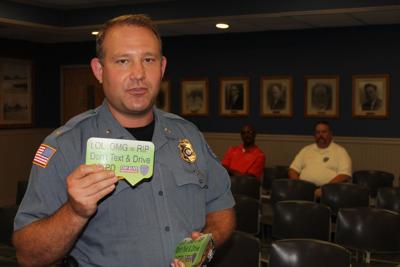 Teen designs magnet to help police fight distracted driving