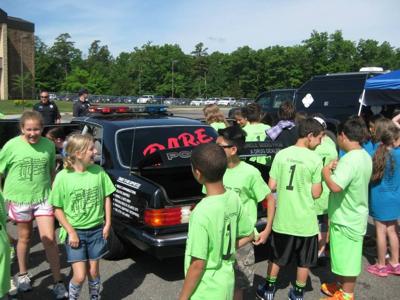 Miller students take pledge to stay drug-free at annual DARE day