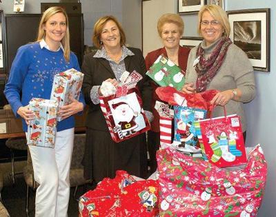 Cape Regional Physicians Associates gives shoes to students