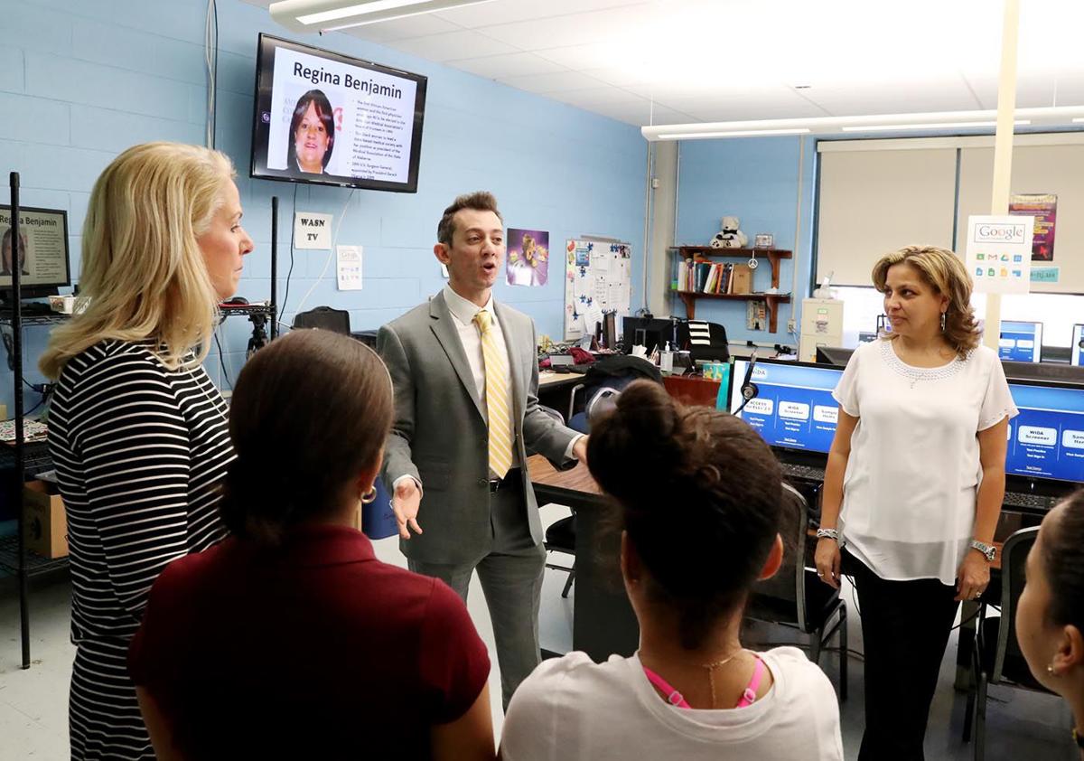 Meteorologist Joe Martucci helps with morning announcements at P'Ville ...