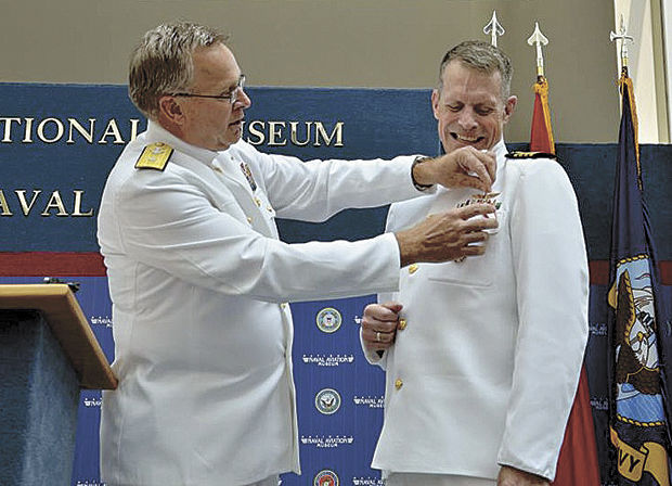 Two brothers, both decorated Navy commanders, returning to civilian ...