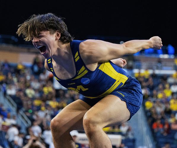 Bear alum Charlie Larson helped Michigan win NCAA gymnastics title ...