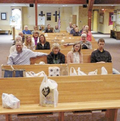 Food shelf supporters ‘Pack the Pews’ | News | presspubs.com