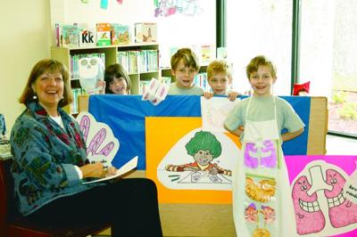 Kids put on puppet show at Cambridge library | | presspubs.com