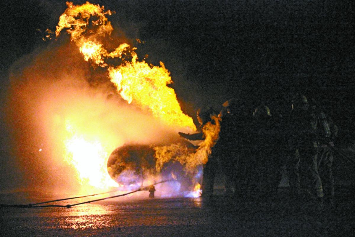 Area firefighters tackle burning propane tank drill | News | presspubs.com