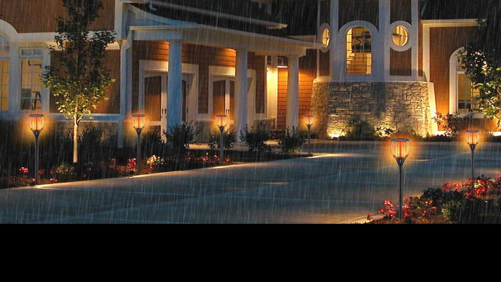 People are loving these flameless solar torch lights | Home-and-garden ...
