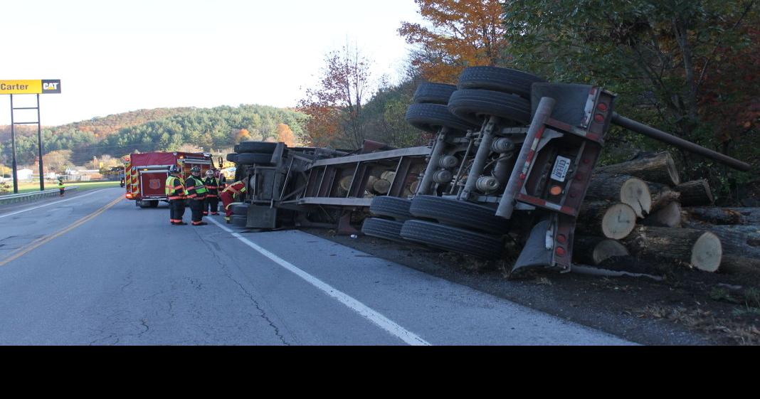 Log truck flips near Princeton | News | ptonline.net