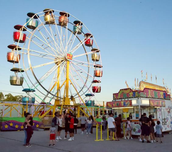 Bright lights and cotton candy, bull riding and livestock shows bring ...