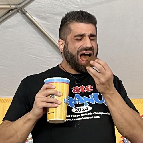 Champion eater sets fudge-eating world record at Uranus competition ...