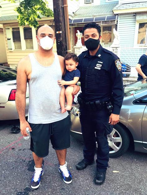 Cop saves baby from fire | | qchron.com