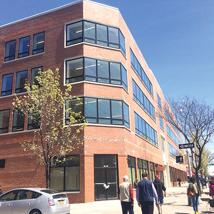 Bruson Building (finally) gets CO | | qchron.com