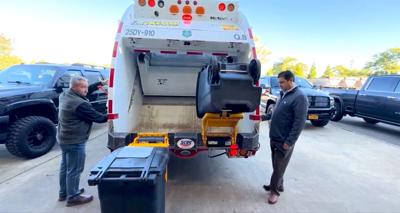 Trucks won’t lift trash over cars | | qchron.com