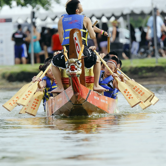 Colorful dragon boats ply the water | | qchron.com
