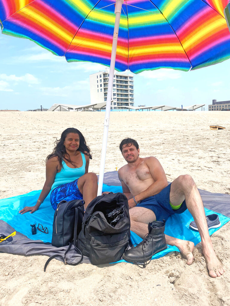 Cautiously catching rays and dipping toes | | qchron.com