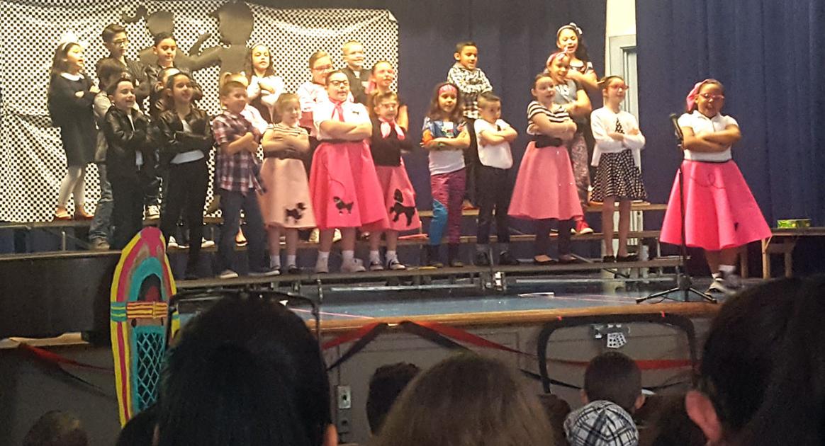 Third-grade students from PS/MS 146Q perform in a '50s musical ...
