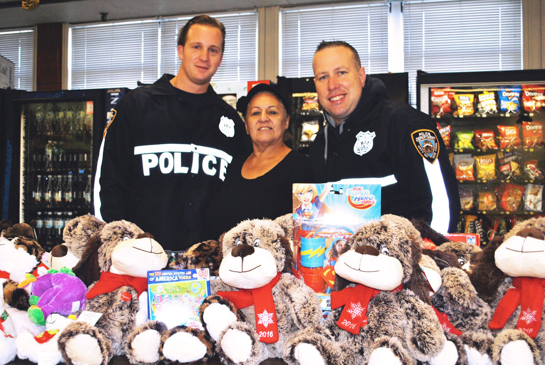 Santa’s big helpers at the 113th Pct. | | qchron.com