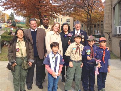 Boy Scouts march in parade | | qchron.com