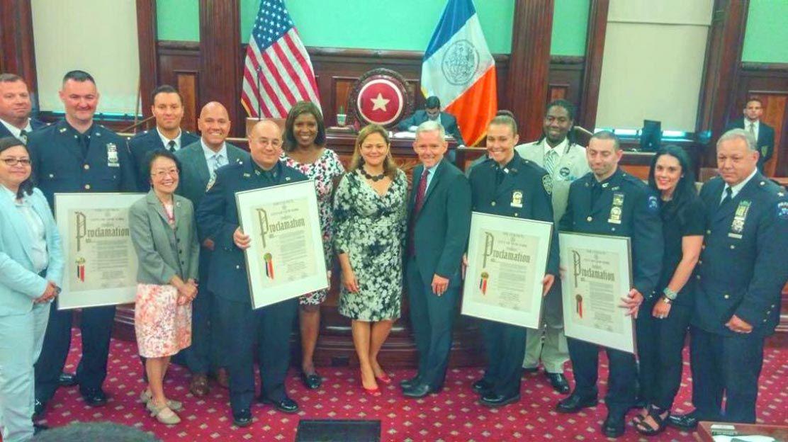 Hero cops honored by city | | qchron.com