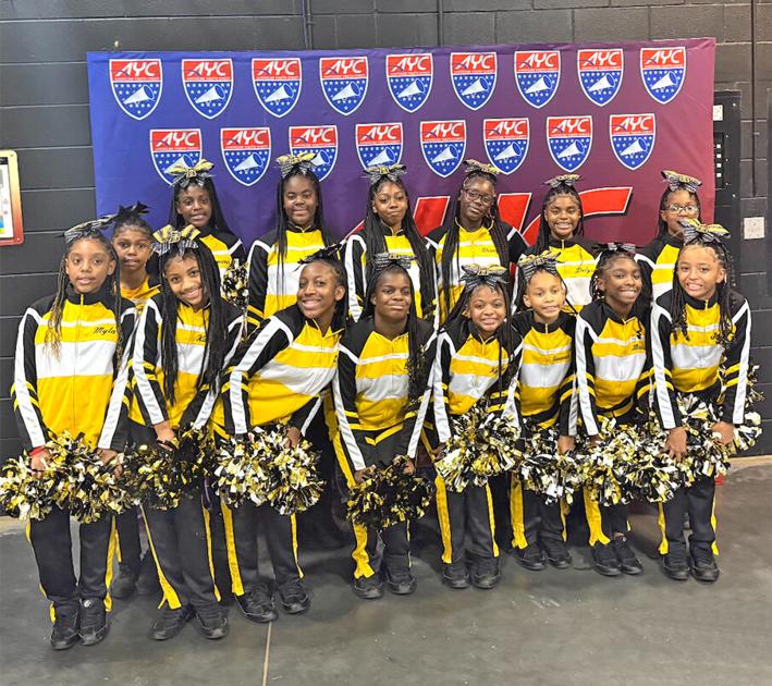 Cheer squad wins third-place trophy | | qchron.com