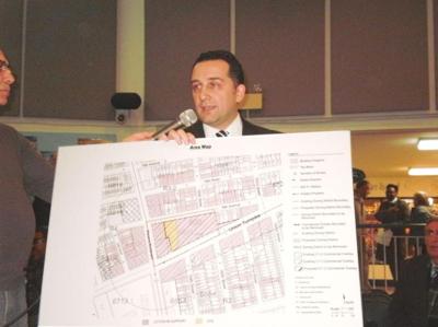 CB 8 approves smaller building | | qchron.com