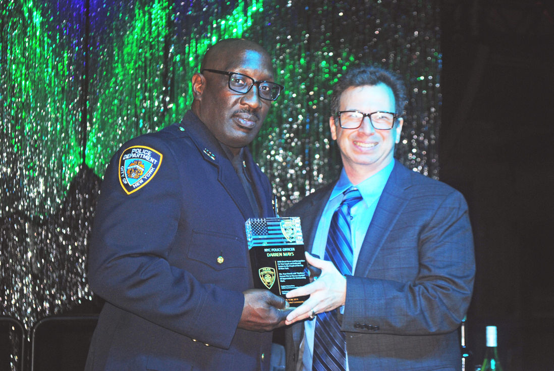 104th honors NYPD bee man and G-COP | | qchron.com