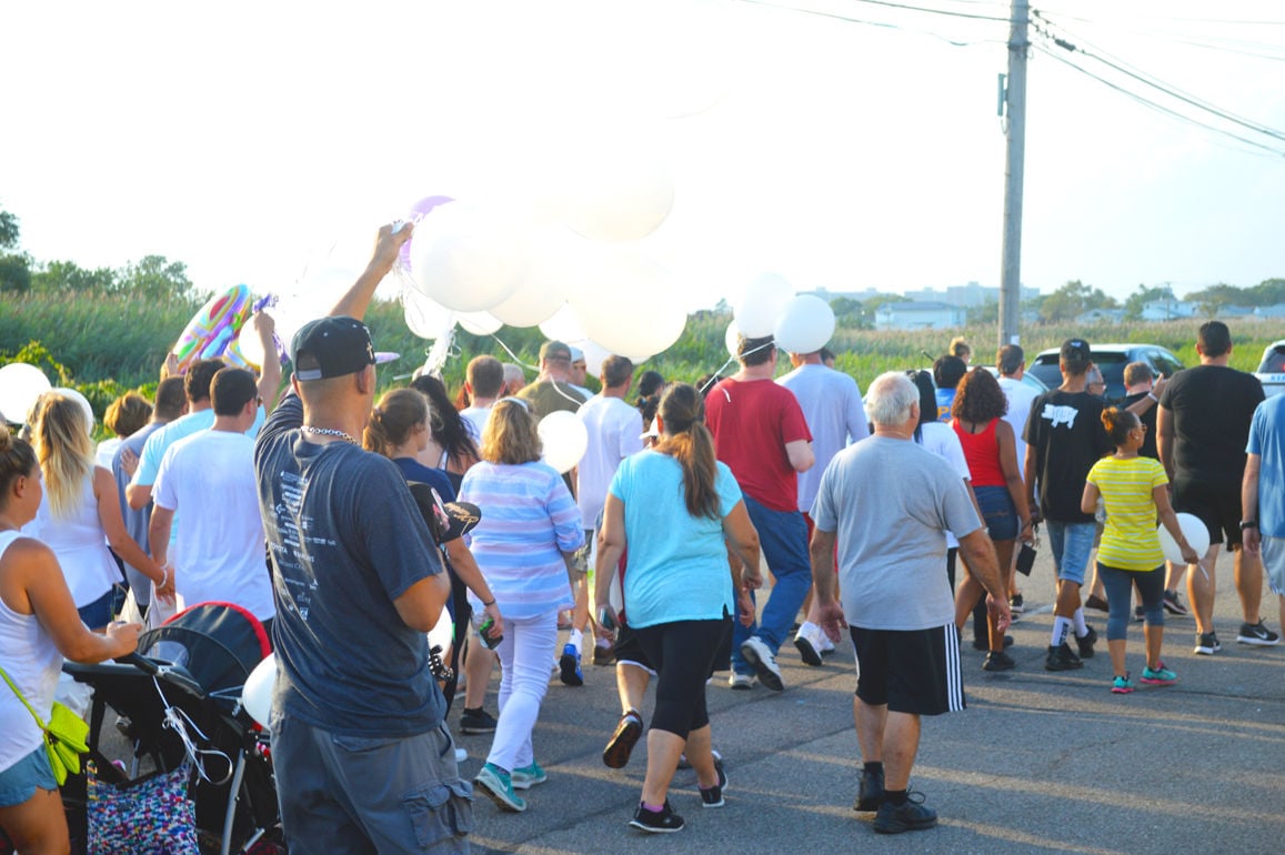 Standing behind the Vetrano family | | qchron.com