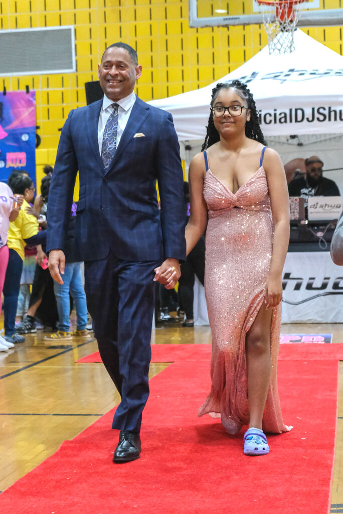 Teens all smiles at NYPD’s 10th Prom Impact | | qchron.com