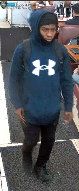 Man charged in gun murder | | qchron.com