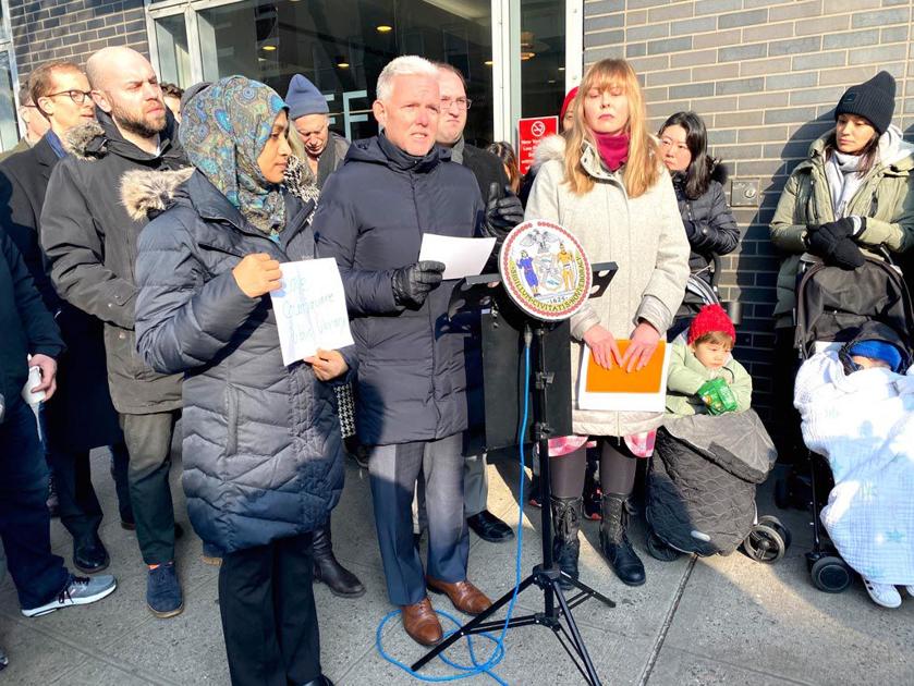 Trading charges at Court Sq. Library | | qchron.com