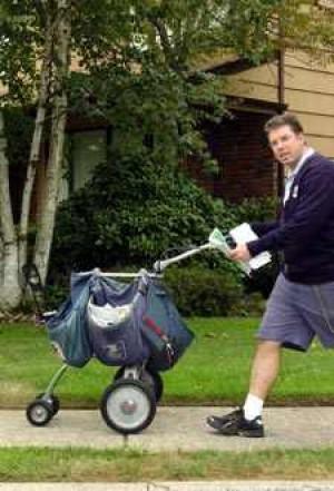 Postman Up For Commendation For Stopping Runaway Minivan | | qchron.com