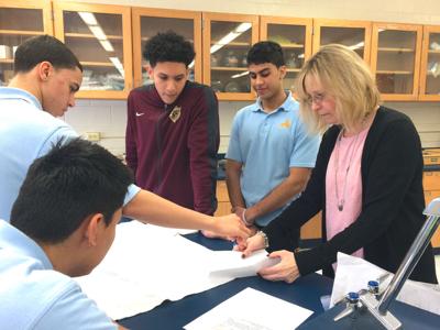 Christ the King H.S. forensic science class project | | qchron.com