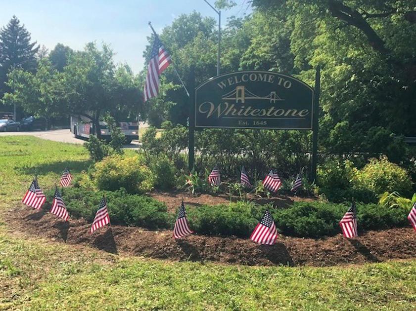 Civic group brings sign back | | qchron.com
