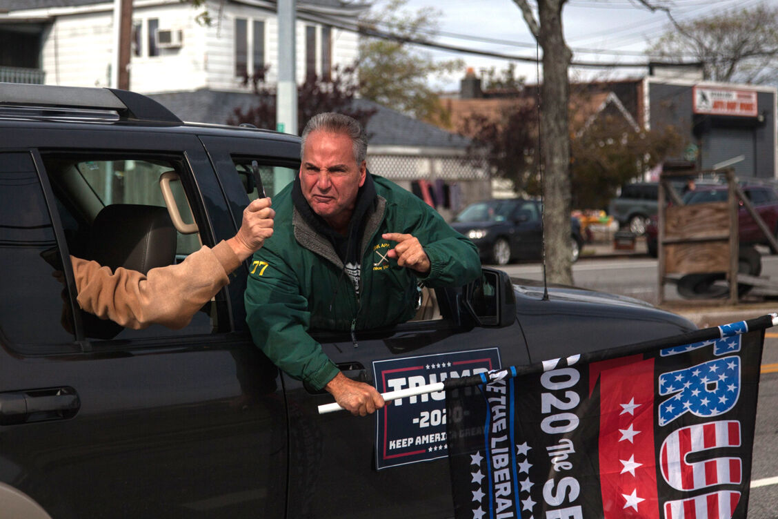 Pro-Trump car rally meets resistance | | qchron.com
