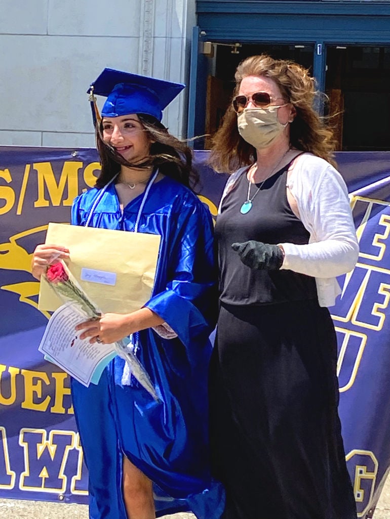 PS/MS 146 honors students with drive-by graduation event | | qchron.com