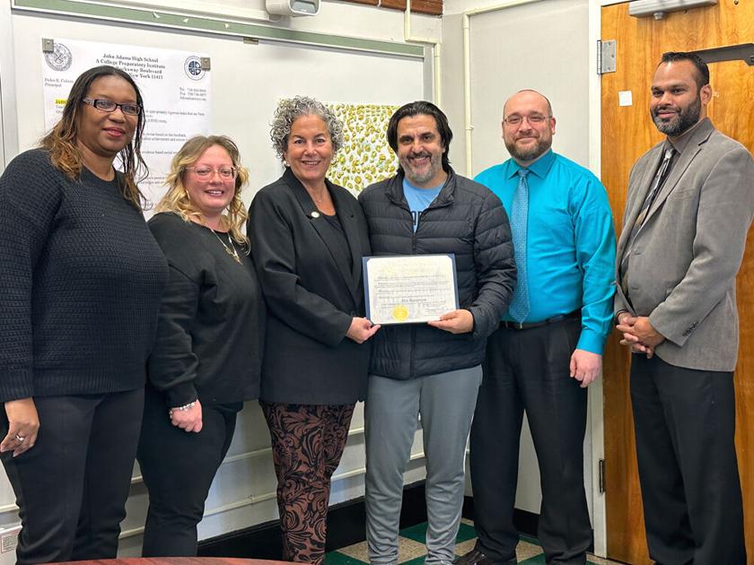 John Adams High School swim teacher saves a life | | qchron.com