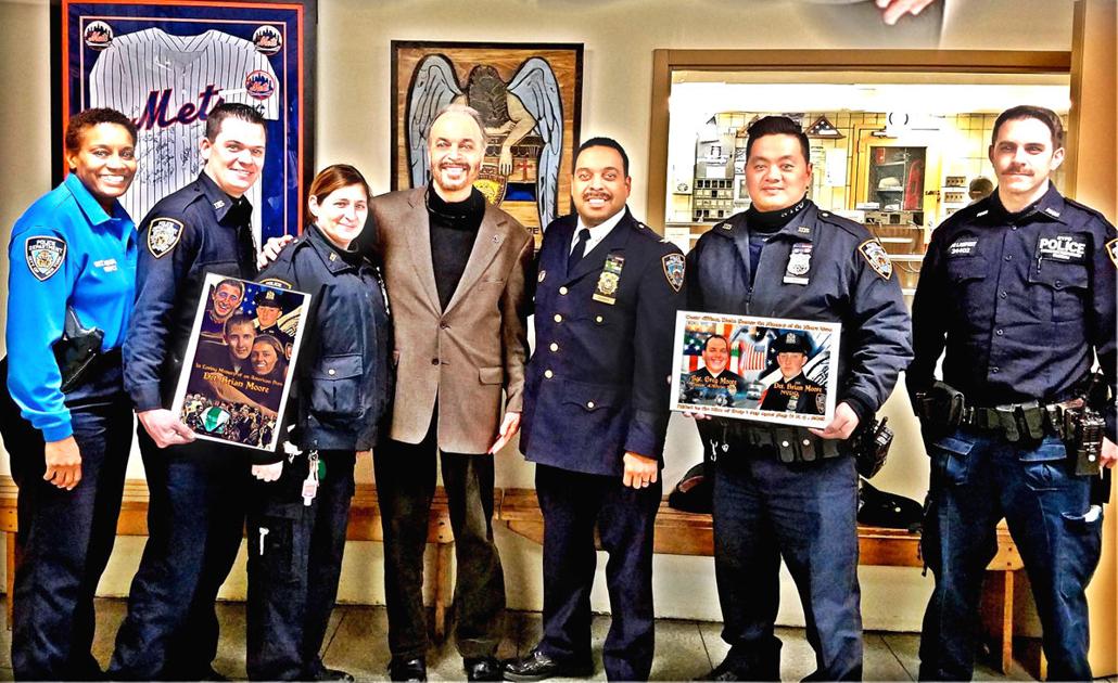 Artist honors slain NYPD, Idaho cops | | qchron.com