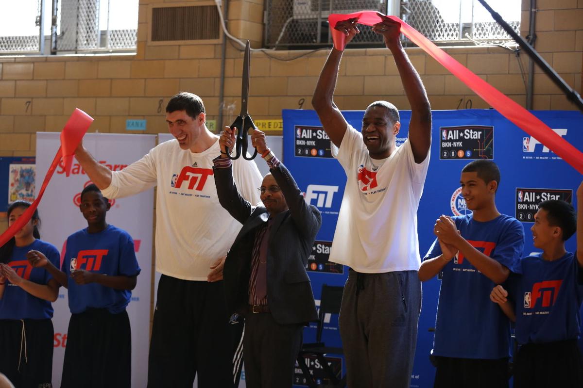 NBA legend helps christen JHS 216's new hoops court | | qchron.com