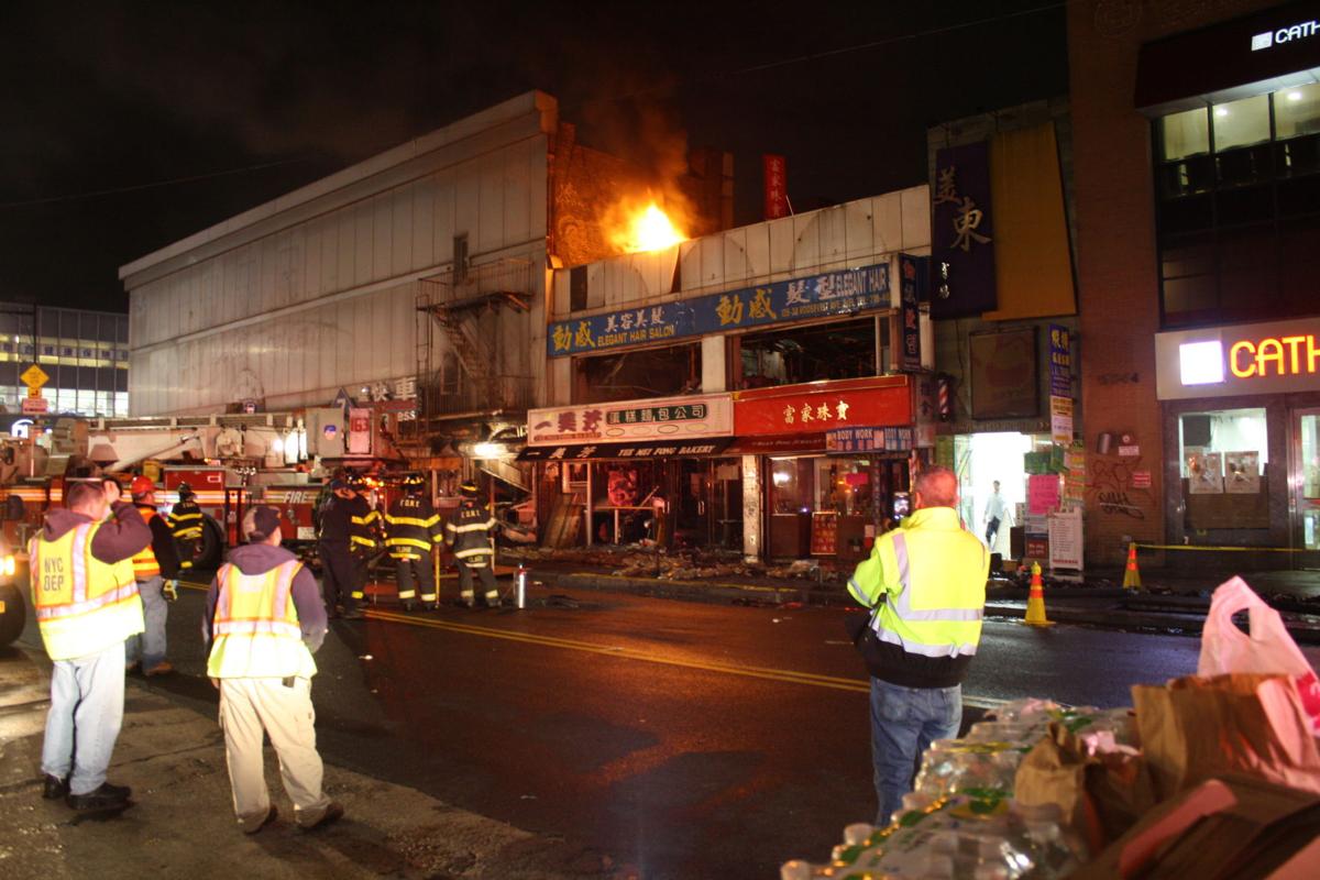 Flushing fire guts three businesses, floods subway station | | qchron.com