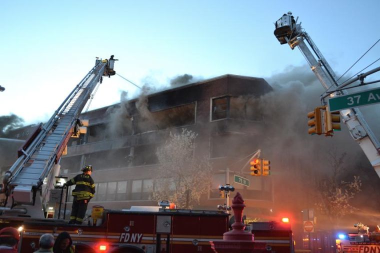 Flames rip through Jackson Heights | | qchron.com