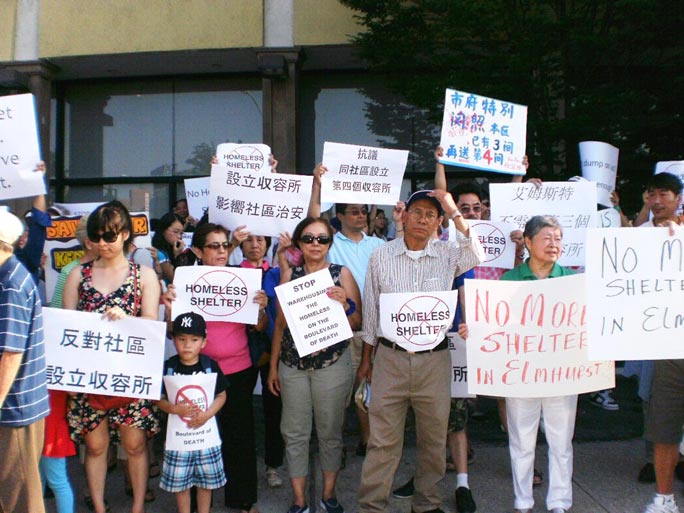 Protesters slam city on Elmhurst shelter | | qchron.com