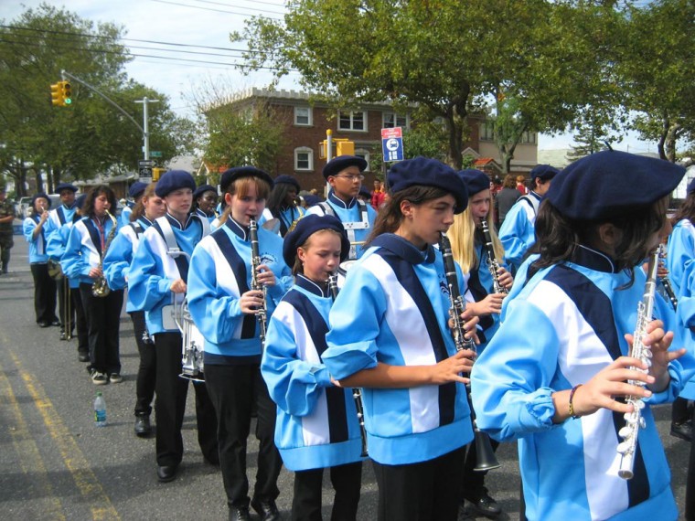 Columbus Day parade draws thousands | | qchron.com
