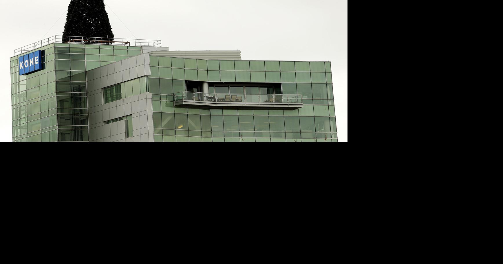Kone tree rewelded, put back atop building