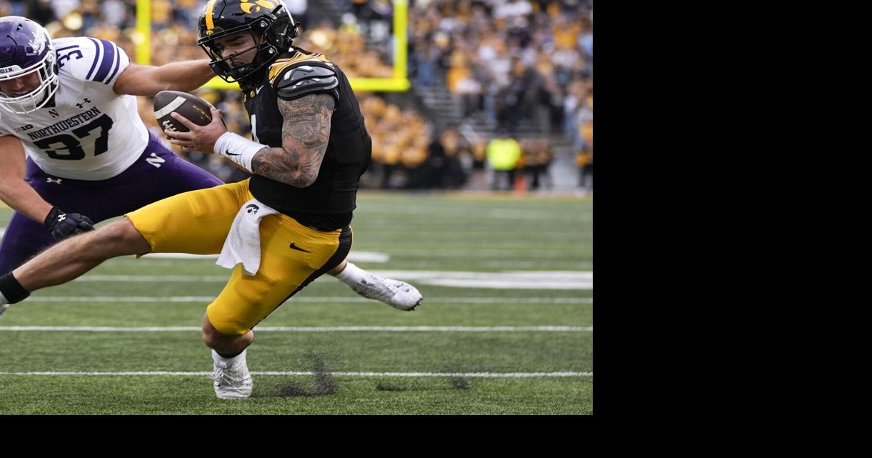 Iowa turns to second-string quarterback, erupts for win