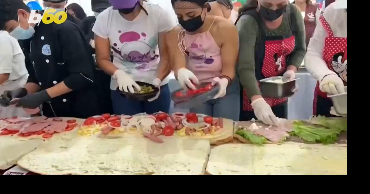 Dozens of chefs work together to craft the world's largest torta in ...